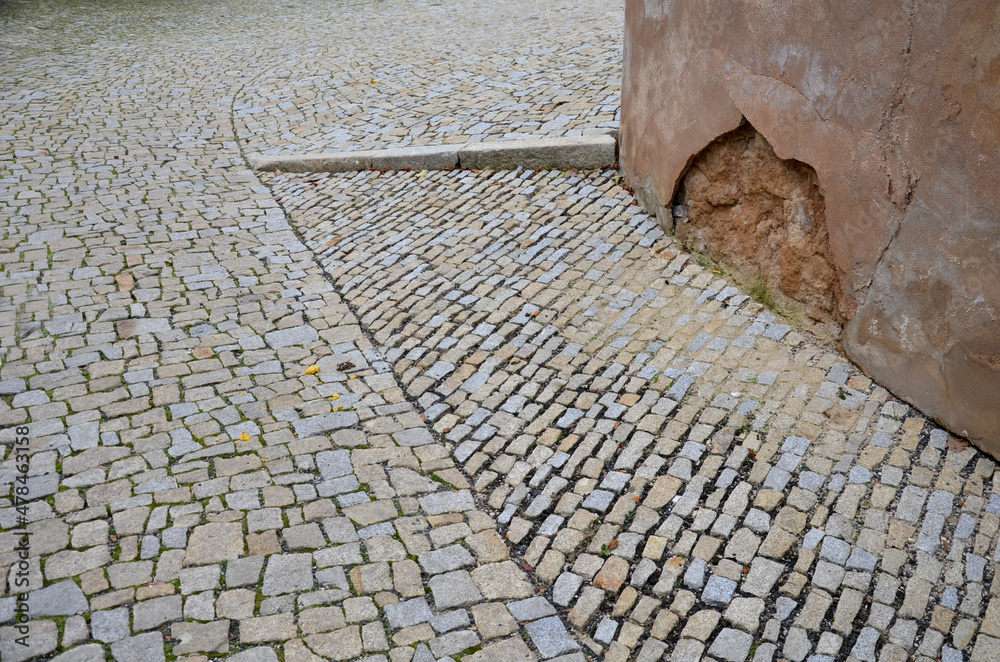 Poster paving composed of different types of stone cubes and tiles ...