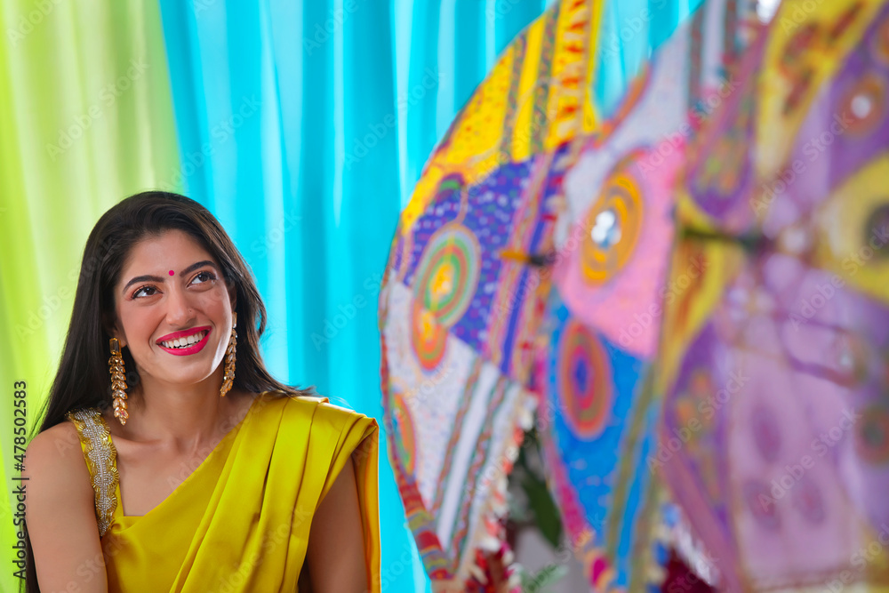 Portrait of an Indian bride in yellow saree during haldi ceremony Stock ...
