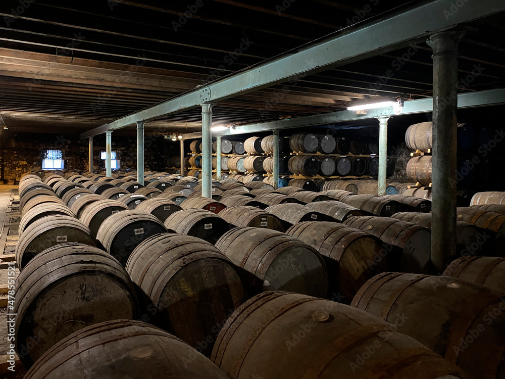 Casks of aging scotch whisky at a distillery in central Scotland Stock ...