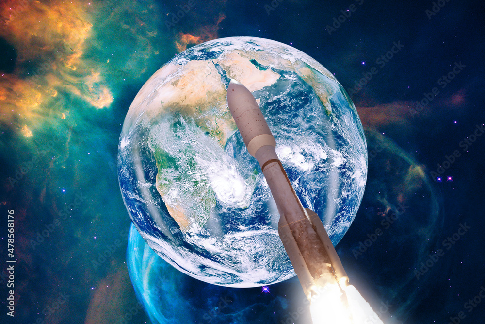 Earth and rocket in space. The elements of this image furnished by NASA ...
