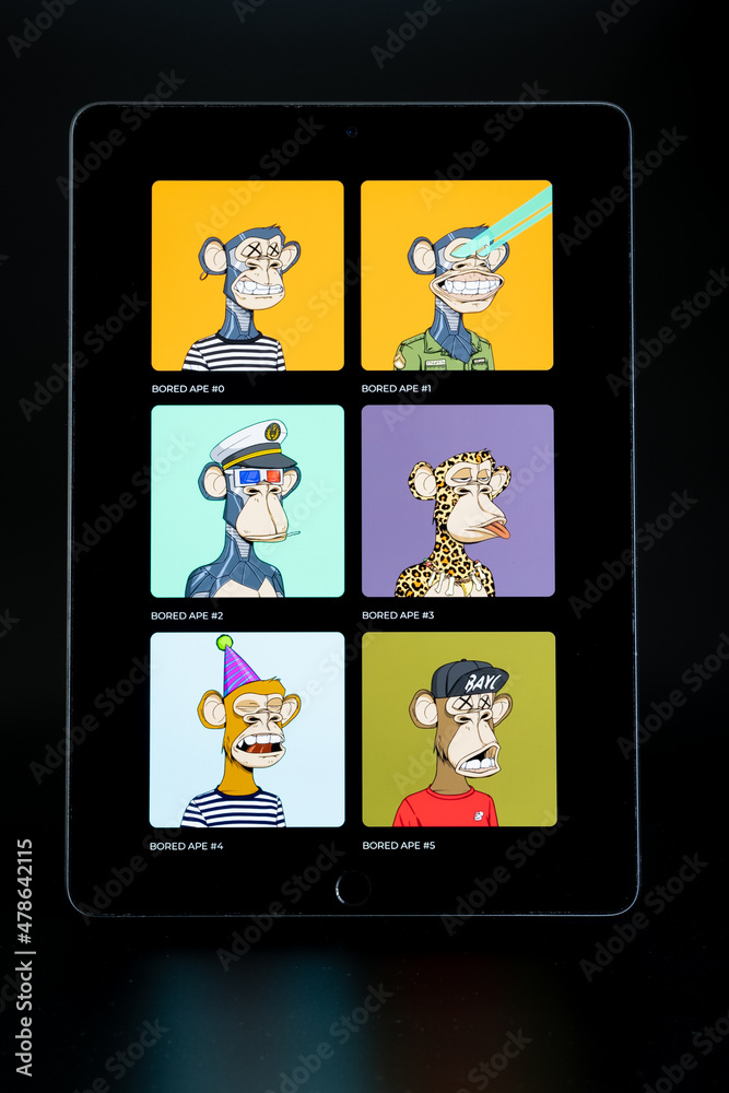 BORED APE NFT digital art collection seen on tablet screen. Bored Ape ...