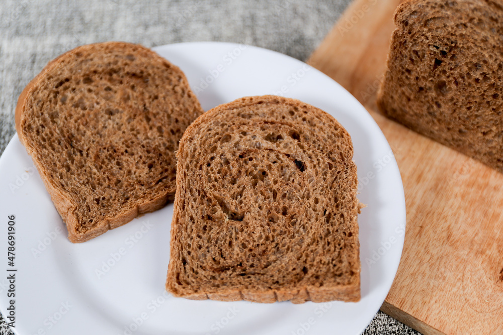 Choco bread loaf slice on a white background. Chocolate flavor Stock ...