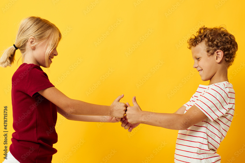 Cute stylish kids standing side by side posing childhood emotions ...