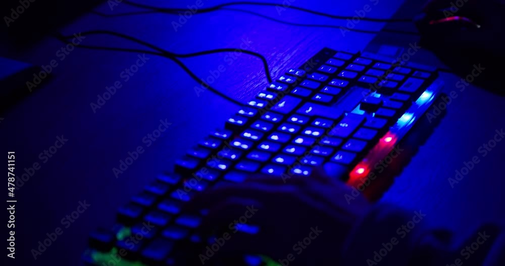 Close up of gamer mouse and keyboard, rgb illuminated pc gaming ...