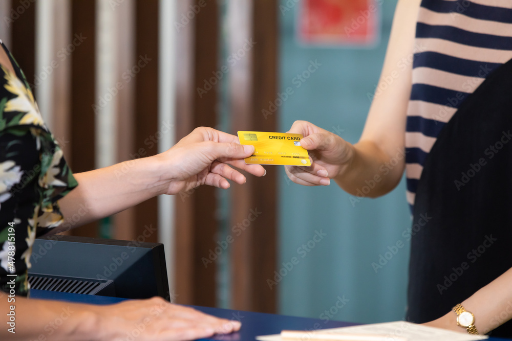 beautiful young asian woman receptionists working at a reception desk ...