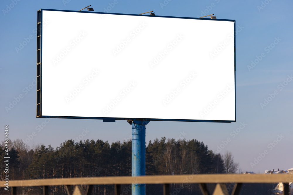 Billboard along the road and highway on a winter snow day. Background ...