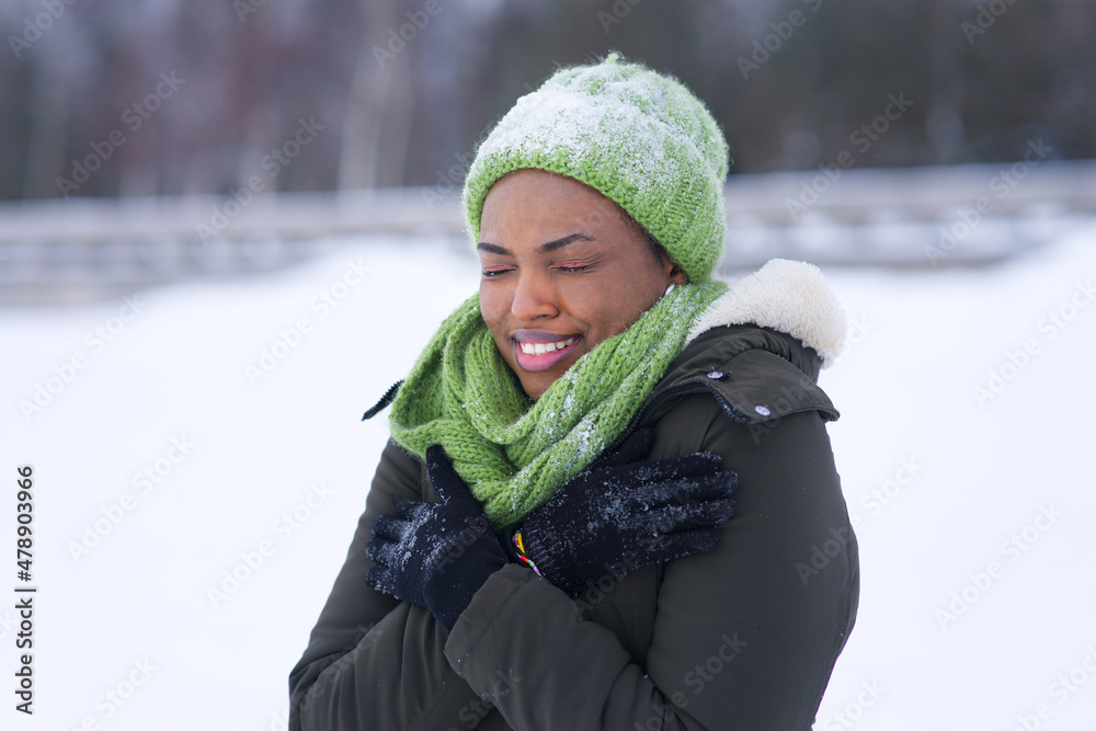 Portrait of frozen suffering girl, young black African Afro American ...