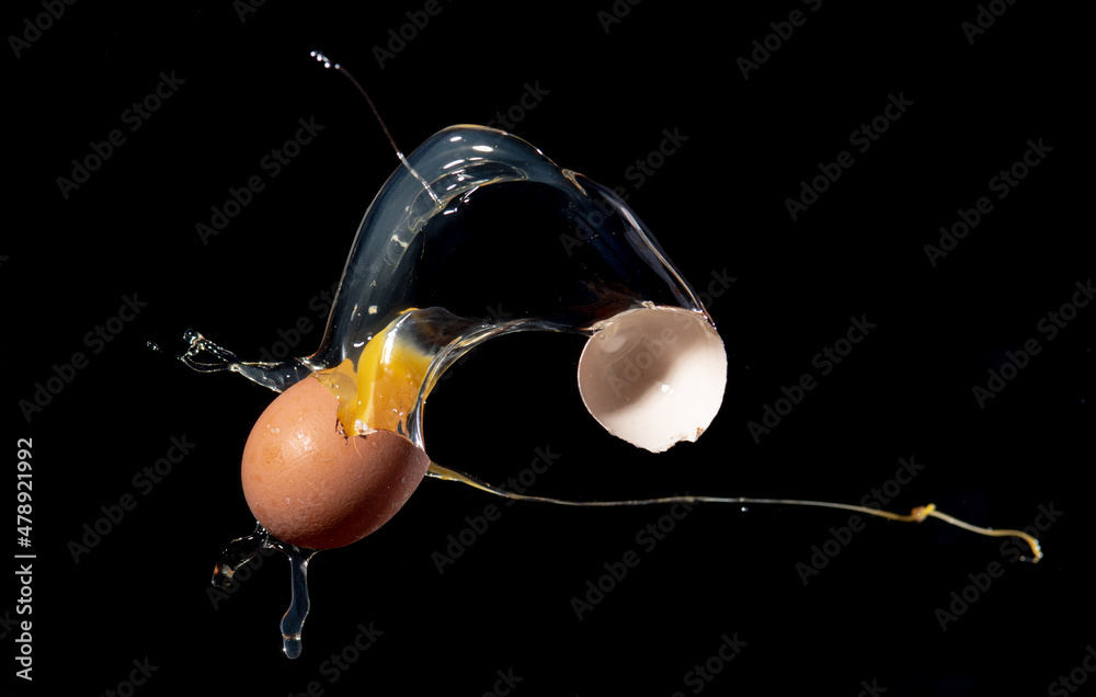 explosion of egg,exploding of egg on black background Stock Photo ...