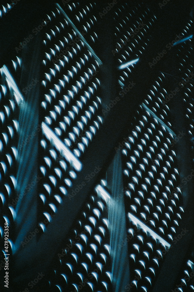 Glowing perforated metal Stock Photo | Adobe Stock