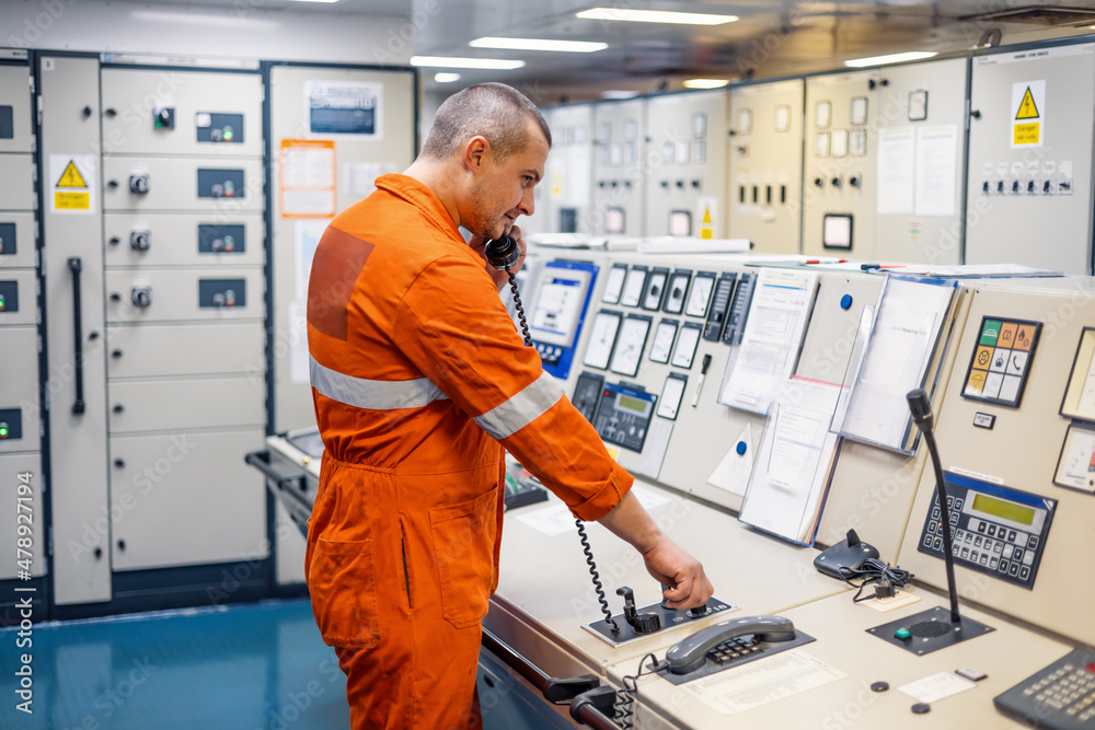 Engineer calling from emergency phone Stock Photo | Adobe Stock