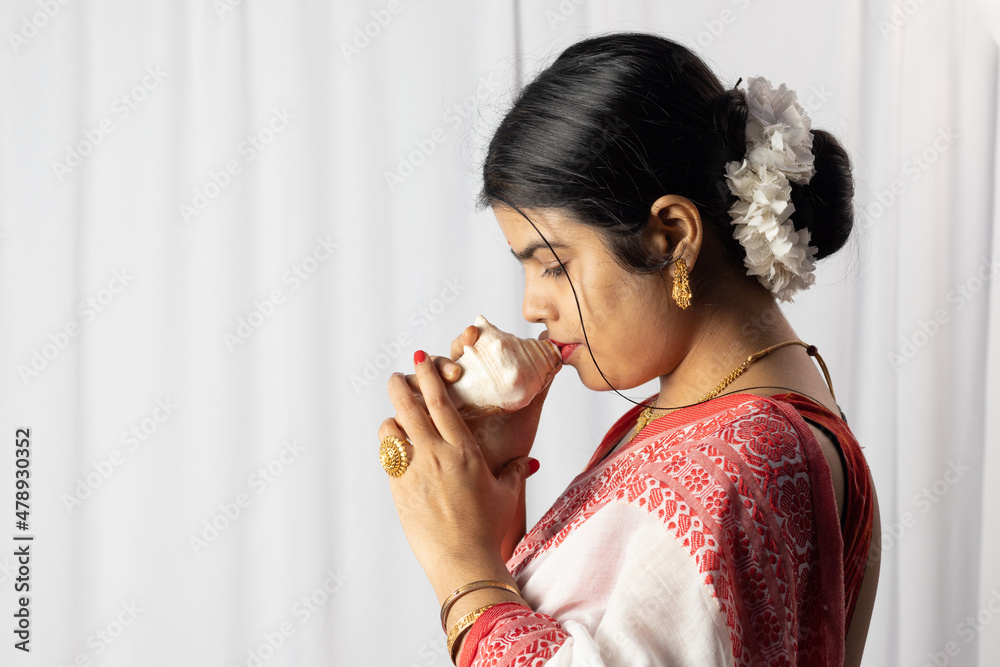 Religious Indian woman in saree Stock Photo | Adobe Stock