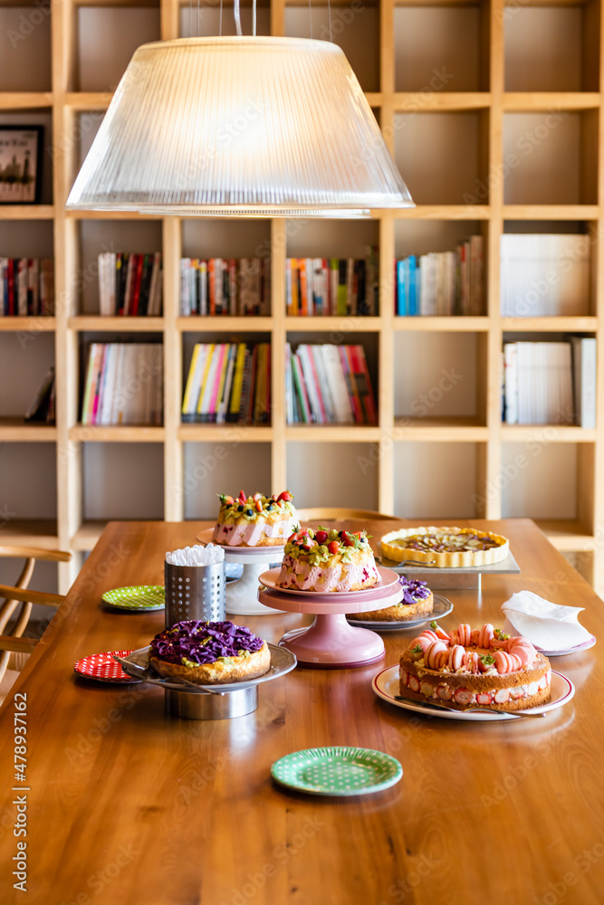 Wooden table with delicious cakes and pies in coffee shop. Stock Photo ...