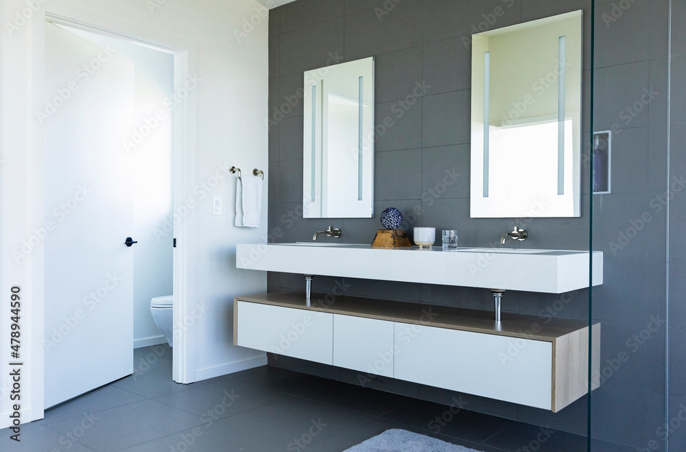 Luxury Bathroom in Home with elegant tile work Stock Photo | Adobe Stock
