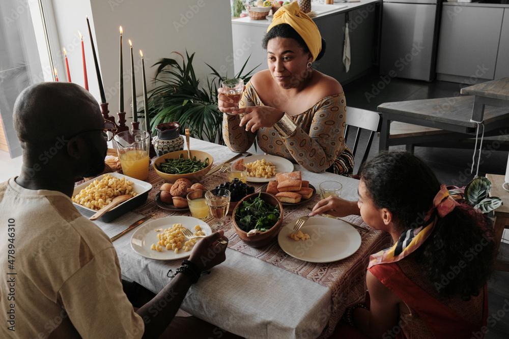 Black Family Having Festive Dinner Stock Photo | Adobe Stock