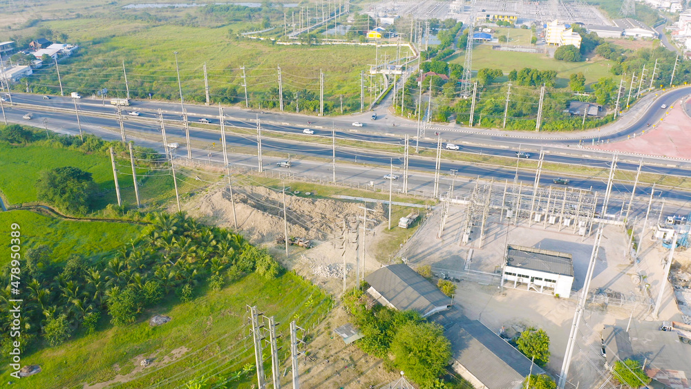 Aerial view of electricity generating, voltage poles. Power lines on ...