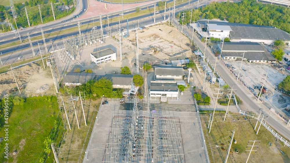 Aerial view of electricity generating, voltage poles. Power lines on ...