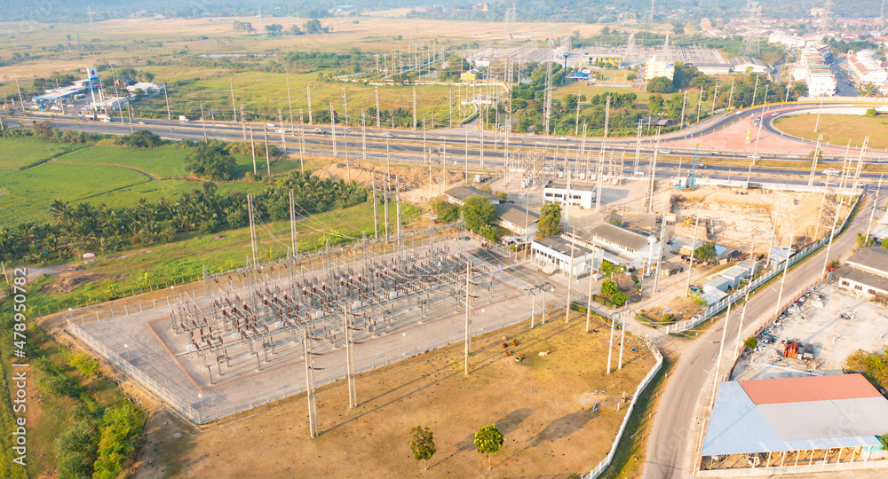 Aerial view of electricity generating, voltage poles. Power lines on ...