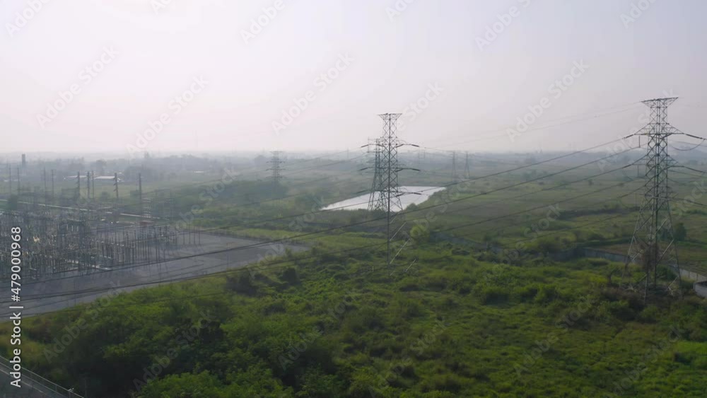Aerial view of electricity generating, voltage poles. Power lines on ...