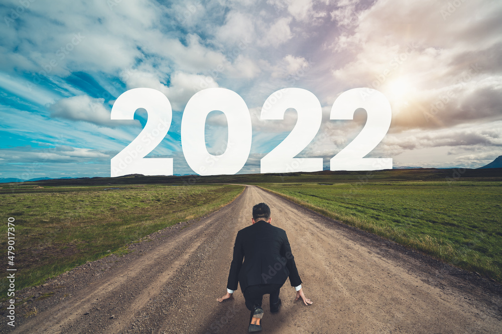 The 2022 New Year journey and future vision concept . Businessman ...