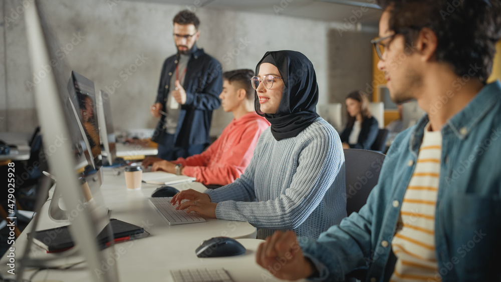 Female Muslim Student Wearing Hijab, Studying in Modern University with ...