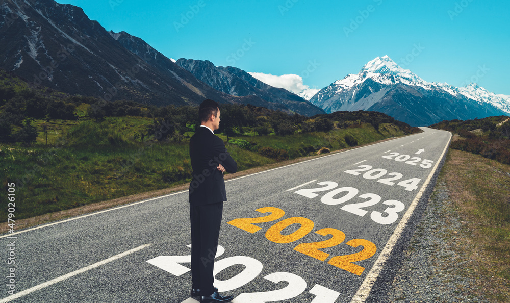 The 2022 New Year journey and future vision concept . Businessman ...