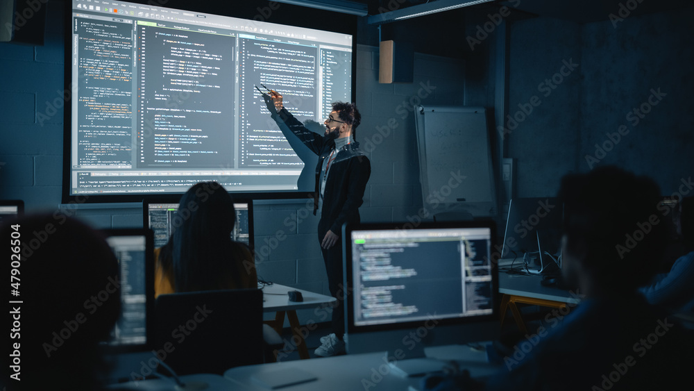 Foto de Teacher Giving Computer Science Lecture to Diverse Multiethnic ...