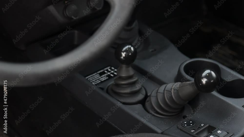 Separate shift lever for off-road vehicle functions. lowered range of ...