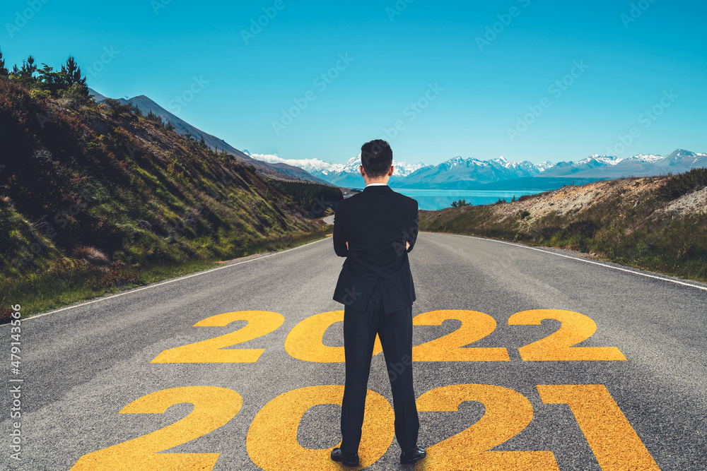 The 2022 New Year journey and future vision concept . Businessman ...