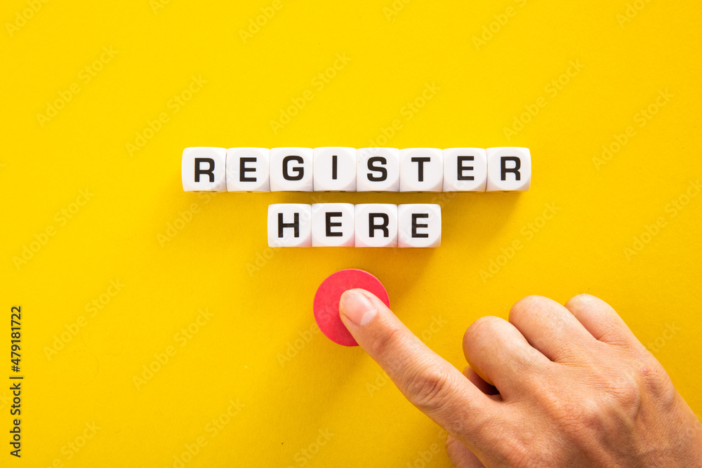 Hand pushing button with Register Here word on yellow background Stock ...