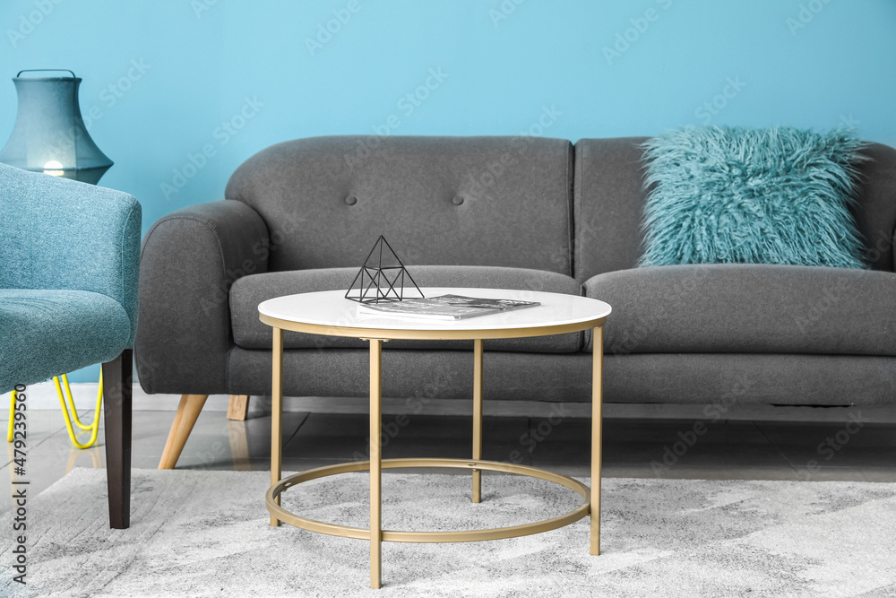 Interior of stylish living room with sofa and coffee table Stock Photo ...