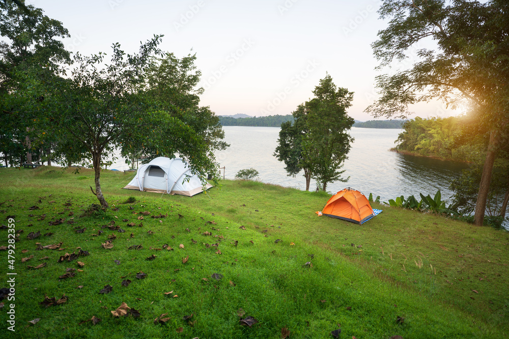 nature landscape autumn camping cabin tents on morning sunlight and ...