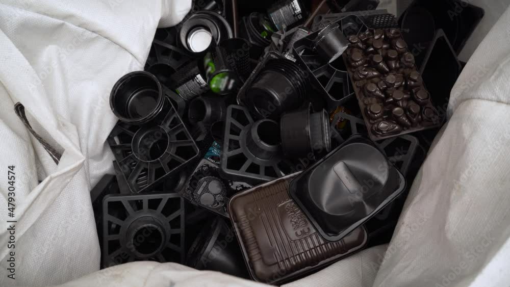 Manual sorting of plastic waste and garbage for recycling and reuse ...