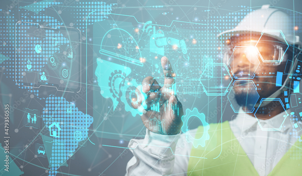 Engineer manager shows intelligent industrial system with software and ...