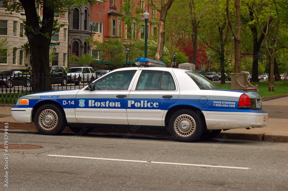 A Boston marked Police Car sits outside of Boston Common, patrolling ...