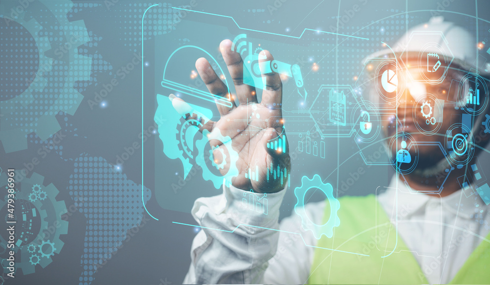 Engineer manager shows intelligent industrial system with software and ...