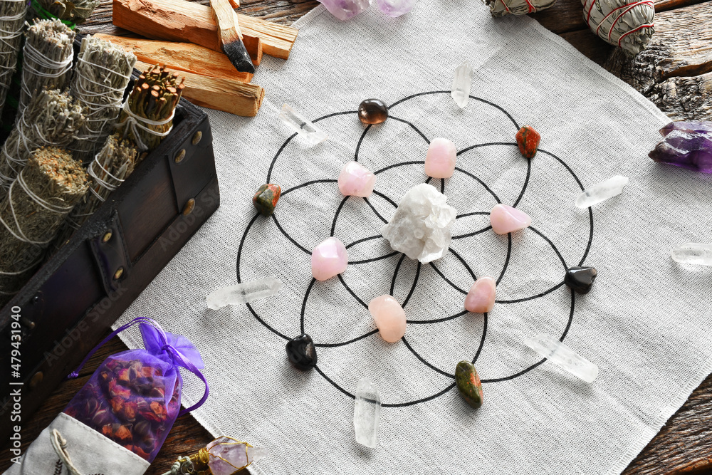 A top view image of a healing crystal grid using healing crystals and ...