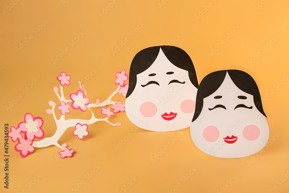 Cute Setsubun paper-craft with Okame mask and sakura blossom branch ...