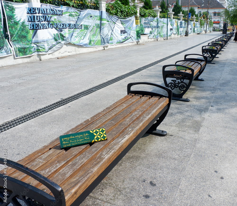 chairs around the pedestrian path in the Malioboro street area which ...