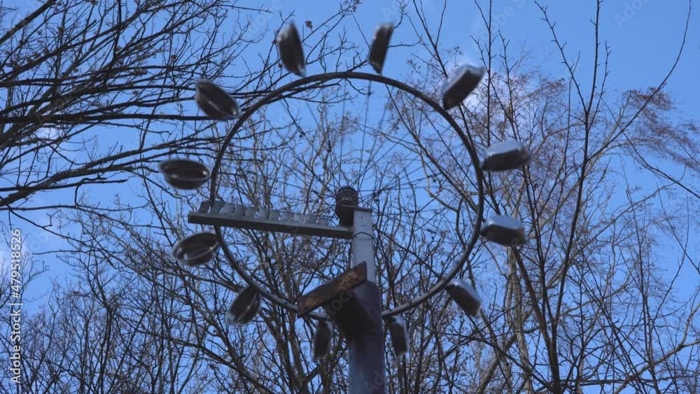 Wind vane spinning in the wind. Weather station for observing the ...