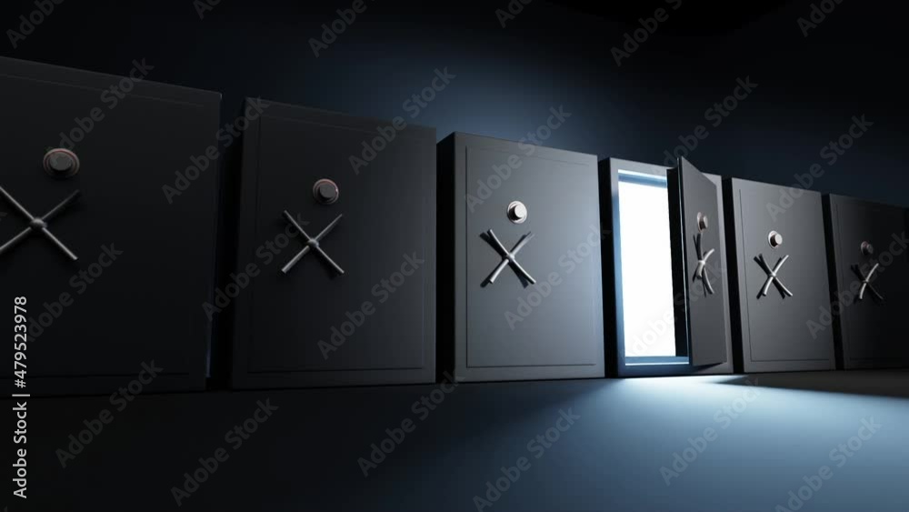 Black bank safes with closed steel doors and one open with white light ...