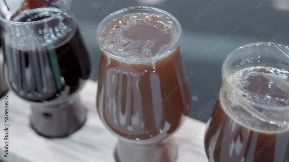 Different types of malt in glasses can be used in bakery, confectionery ...