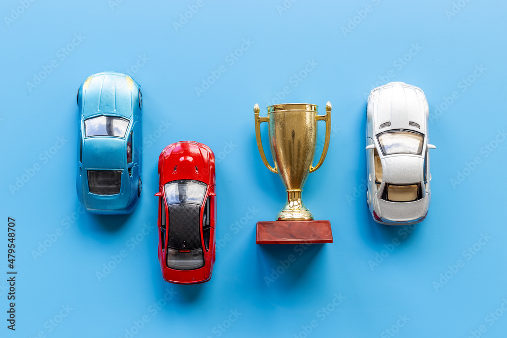 Sport rally car champion award - golden trophy cup with car models, top ...