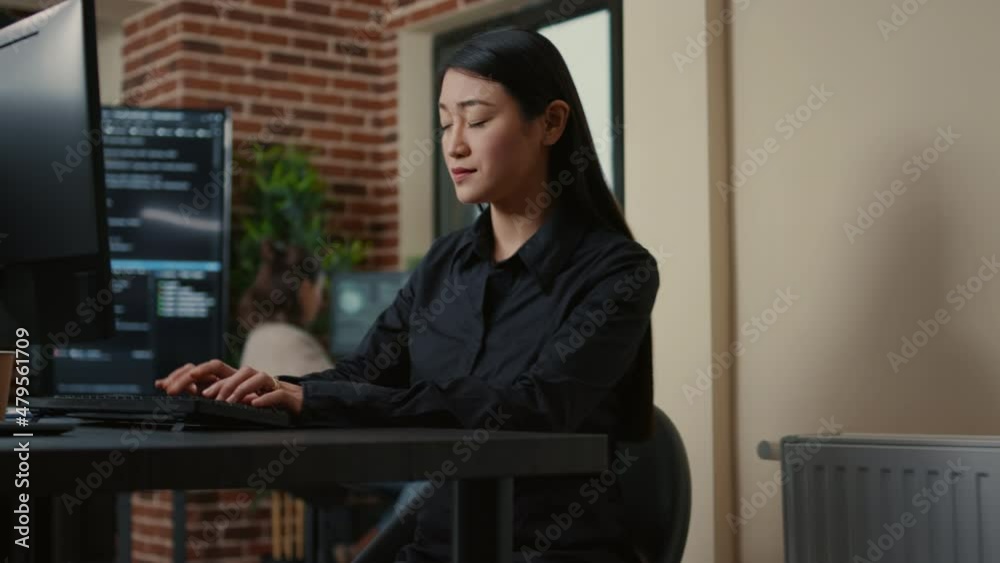 Portrait Of Focused System Engineer Happy With Parsing Results Sitting
