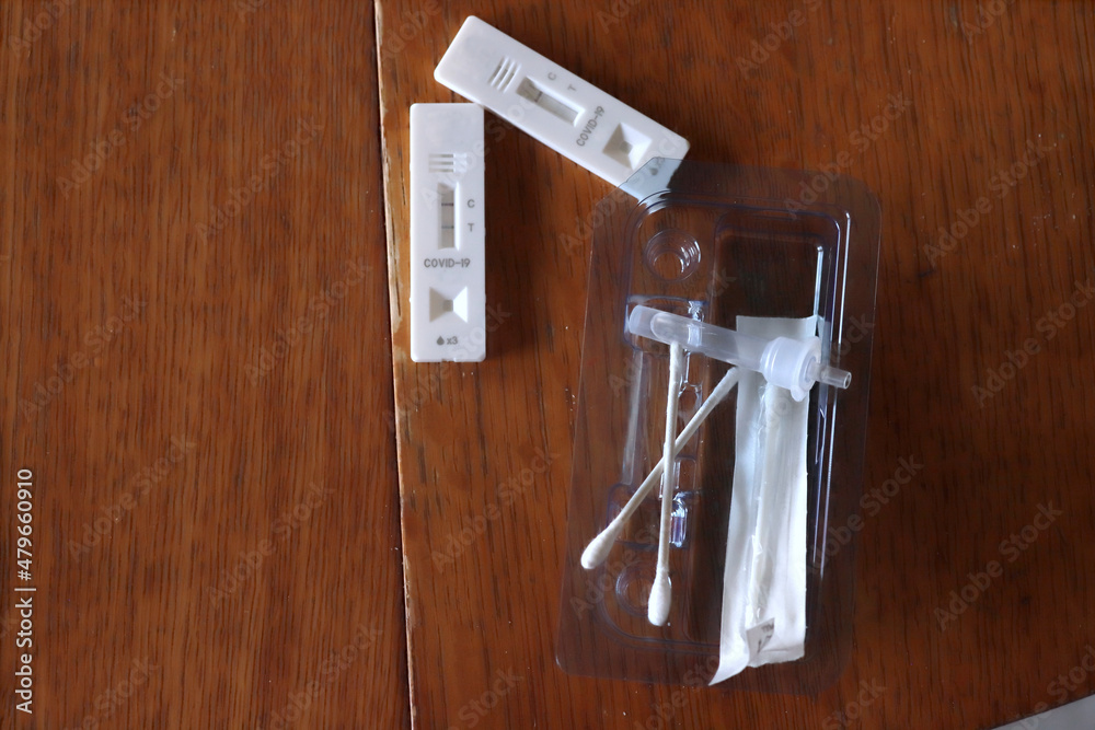 Home test kit, hands using home test kit, at home self test. Stock ...