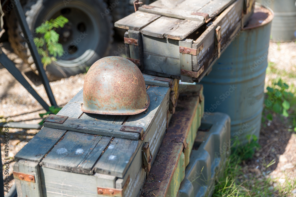 Old metal Helmet Of Infantry Soldier on wooden box. Old military helmet ...