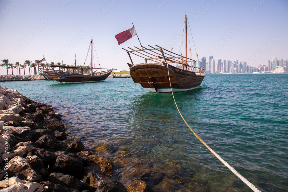 Doha,Qatar- 12,23,2018: Traditional boats called Dhows are anchored in ...