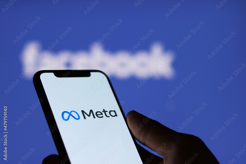 Meta logo on smartphone screen and Facebook logo background : Chiang ...