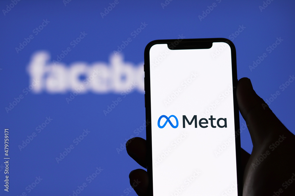 Meta logo on smartphone screen and Facebook logo background : Chiang ...