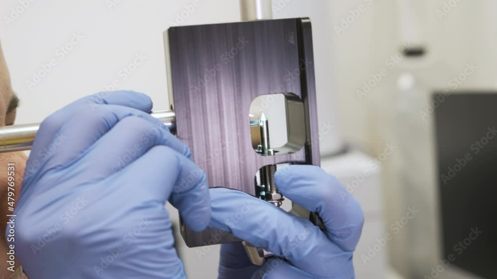 Scientist checking the condition of nebulizer needle from LC MS qTOF ...