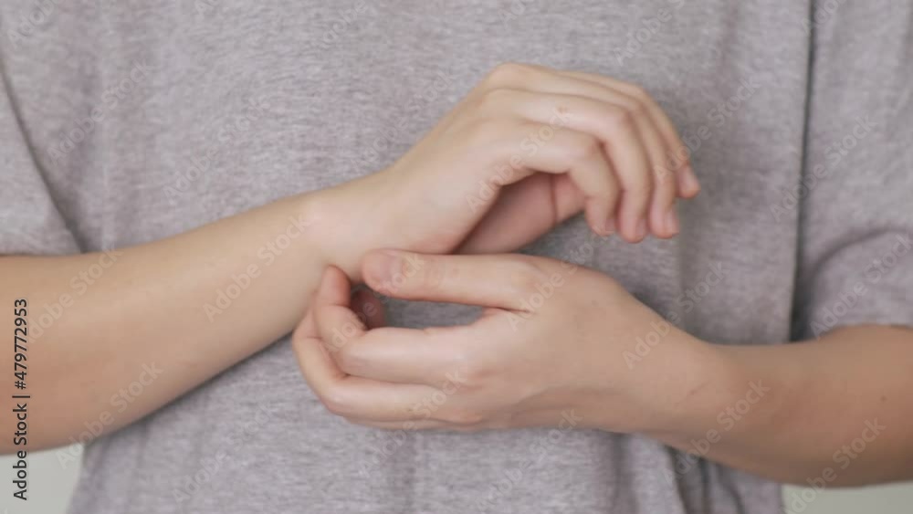 Hand is scratching another hand Scabies, itch, mange, skin diseases ...